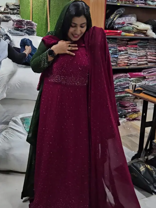 PARTY WEAR FAUX GEORGETTE PUNCHING STONE WORK GOWN
